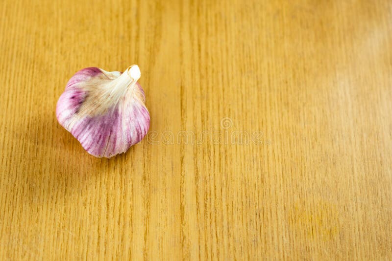 Head of Dried Blue Garlic on a Brown Background Stock Image - Image of ...
