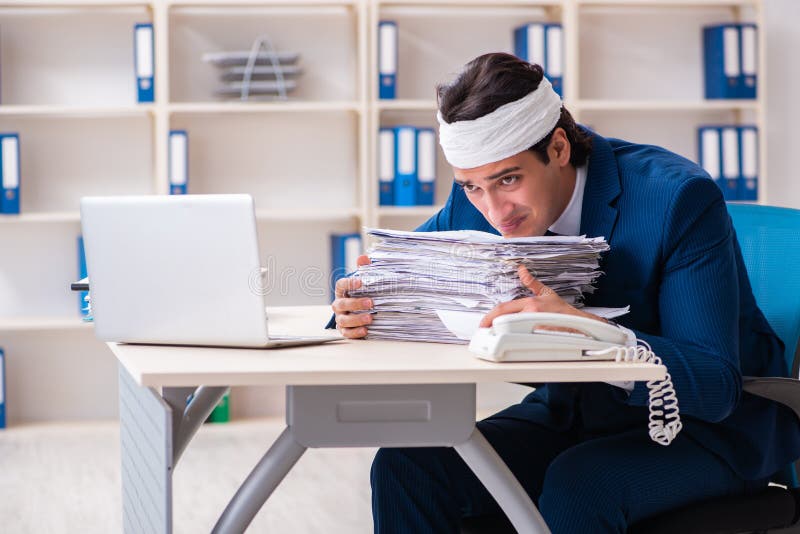 Head Injured Male Employee Working in the Office Stock Image - Image of ...