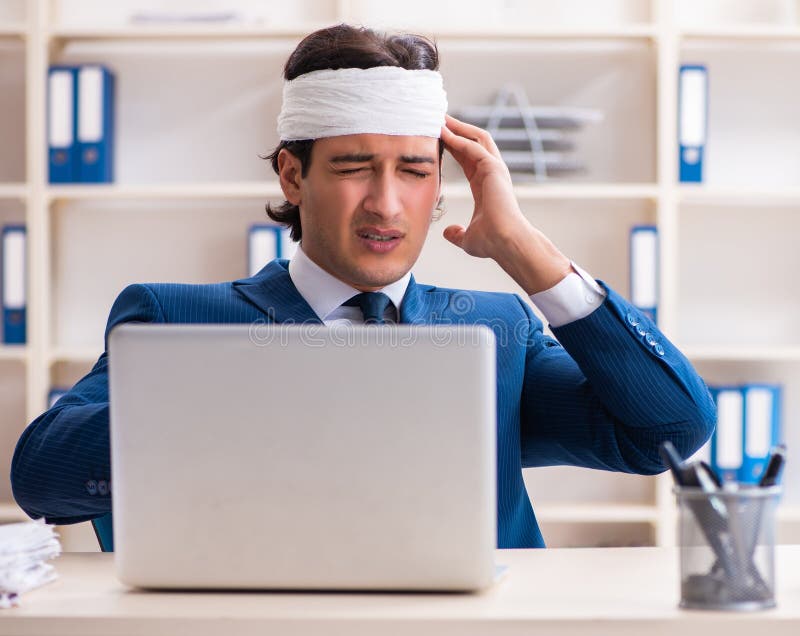 Head Injured Male Employee Working in the Office Stock Photo - Image of ...