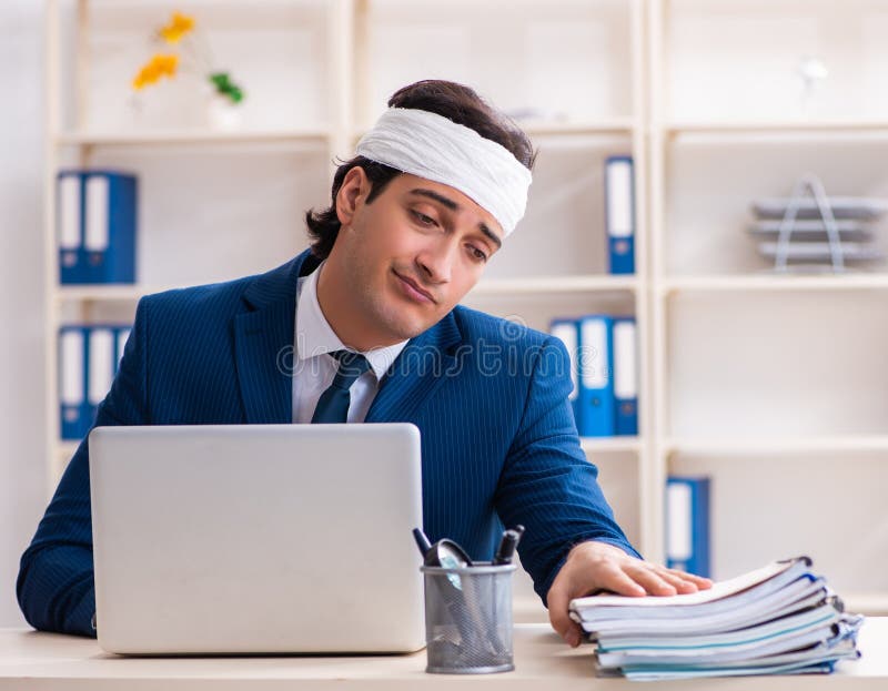 Head Injured Male Employee Working in the Office Stock Photo - Image of ...
