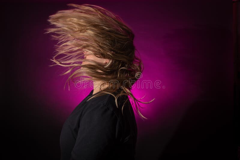 Head Movement on Magenta Background Stock Photo - Image of color, blown ...