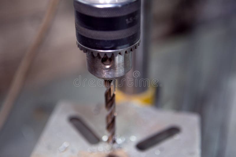 Head of a Production Drilling Machine with a Metal Drill Stock Image ...