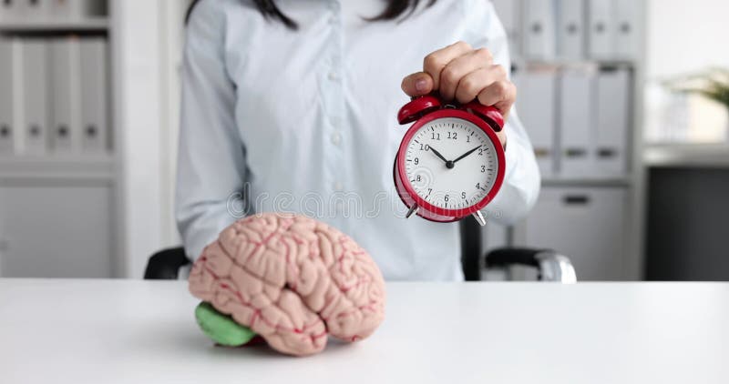 Head Puts Red Alarm Clock with Brain Layout Stock Footage - Video of ...