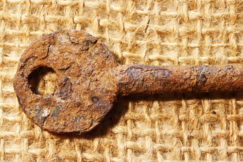HEAD of a SEVERELY RUST COATED KEY on HESSIAN Stock Image - Image of ...