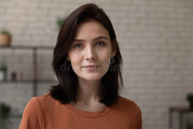 Head Shot Close Up Portrait Of Beautiful Millennial 20s Woman Stock