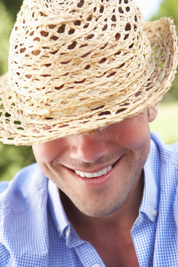 Head and Shoulders Portrait of Smiling Man with Sun Hat Stock Photo ...