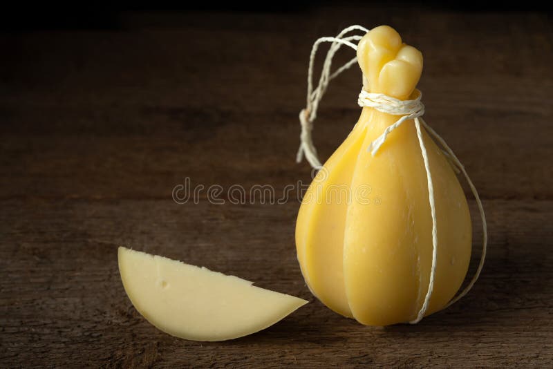 Head and Slice of Typical Italian Cheese Caciocavallo Stock Image ...