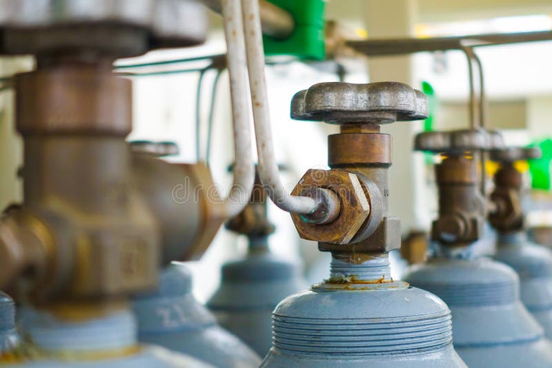 Head and Valve of Nitrogen Cylinder Rack Stock Photo - Image of rack ...