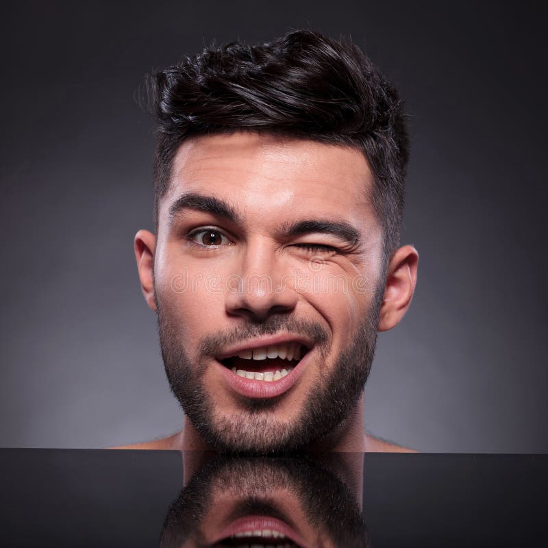 Winking Handsome Man Stock Images - Download 679 Royalty Free Photos