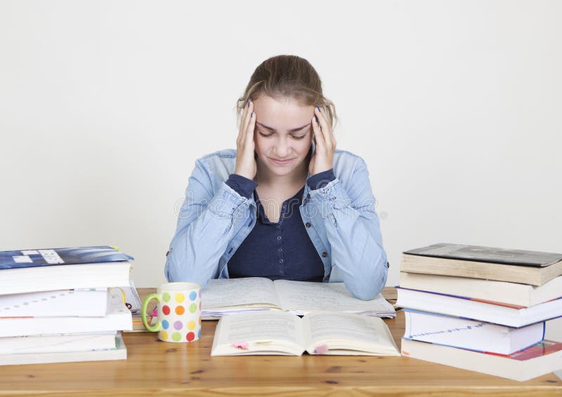 Headache from learning stock photo. Image of pencil, desk - 48052454