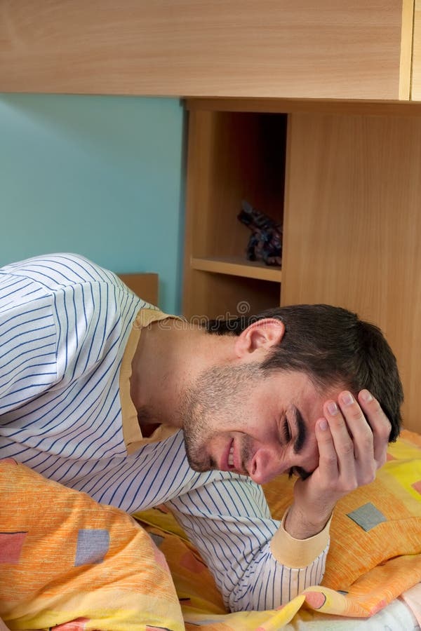 Headache in the morning stock photo. Image of frowning - 19347906