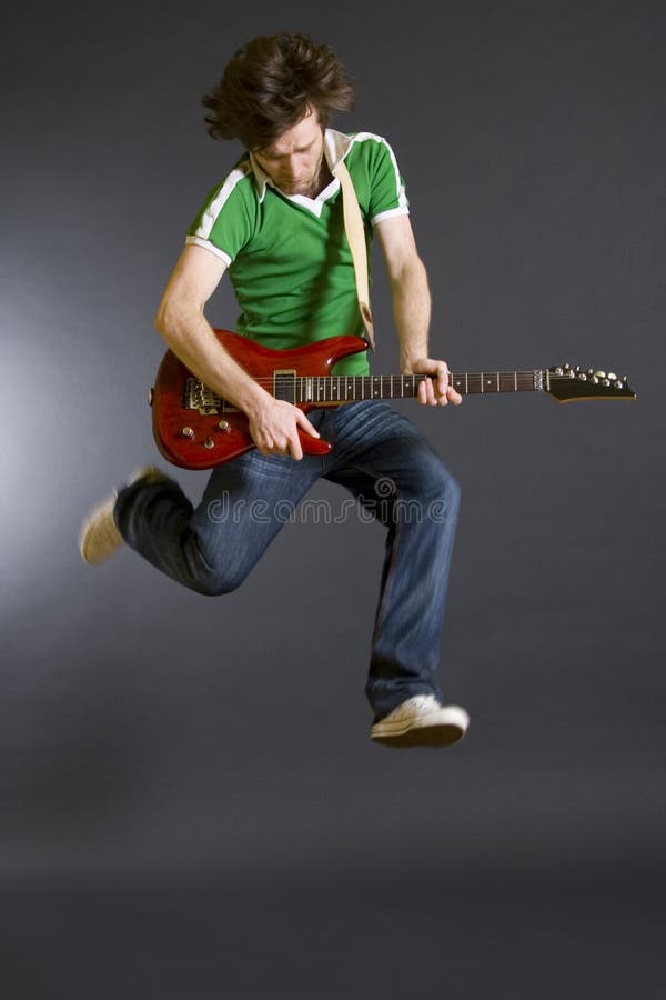 Headbanging rocker stock image. Image of band, hair, music - 16586799