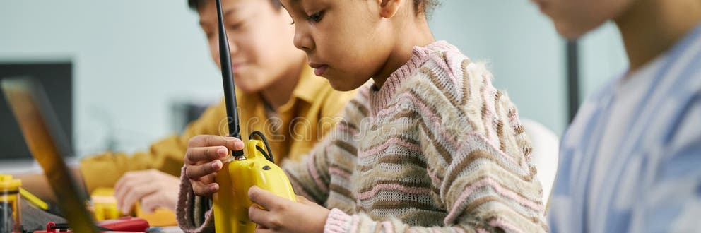 Header Image of Children Interacting with Educational Robotics in ...