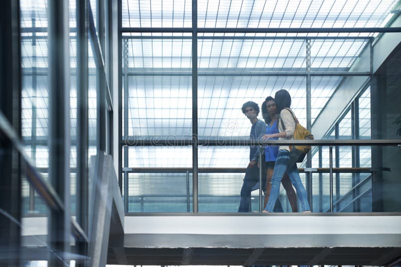 Heading for Their Next Class. a Group of College Students Walking ...