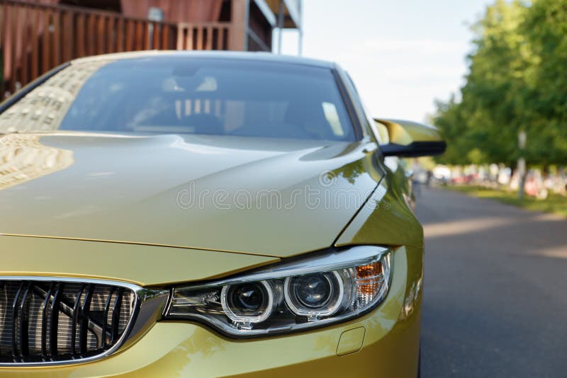 Headlight of Modern Prestigious Gold Car Close Up Stock Image - Image ...