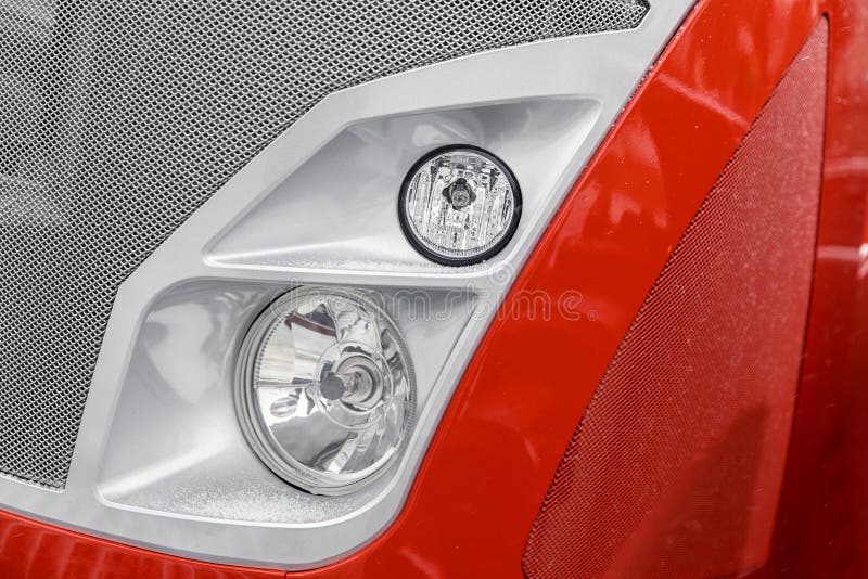 Headlight of a red car stock photo. Image of vehicle - 89307740
