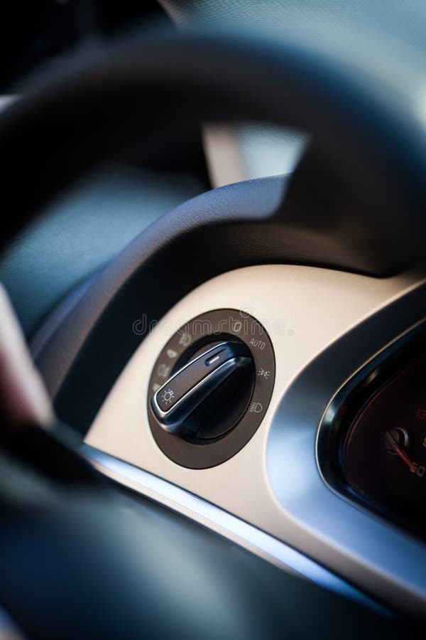 Headlights button in a car stock image. Image of auto - 71007277