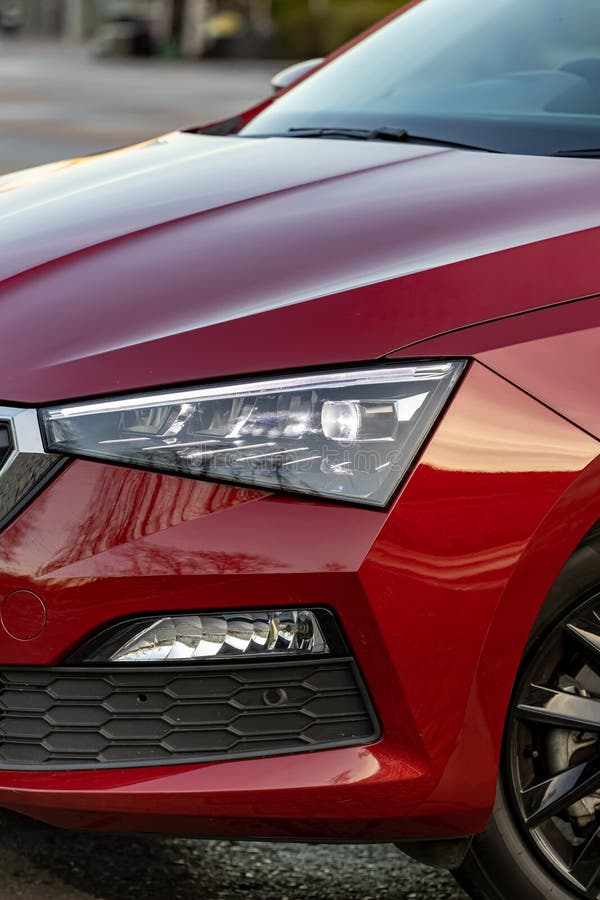 Headlights and Fog Lights of the Red Car. Vertical Stock Image - Image ...