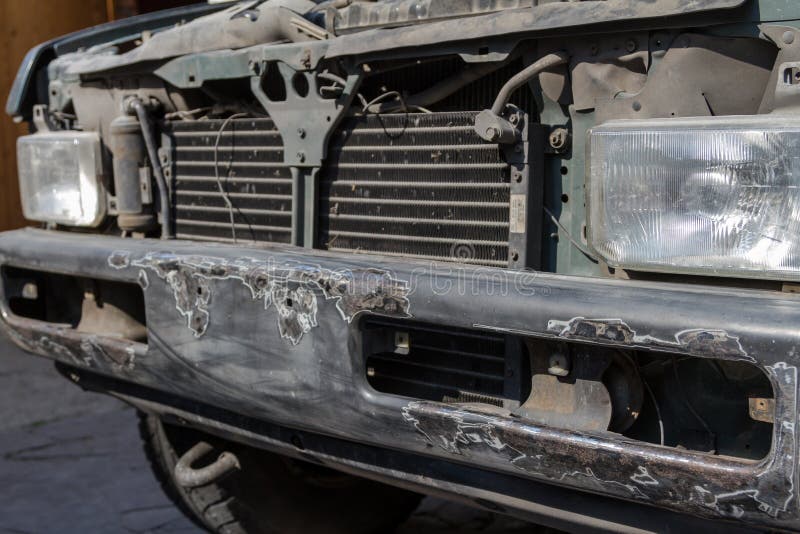 Headlights on an Old and Rusty SUV without a Grille Stock Photo - Image ...