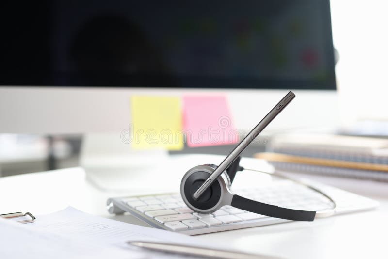 Headphones with Microphone Keyboard and Computer on Desktop Stock Photo ...