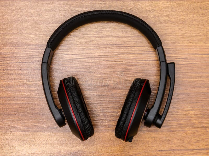 Headphones on the table stock photo. Image of headset - 55095046