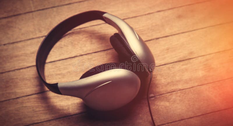 Headphones on a table. stock image. Image of blue, design - 58992975