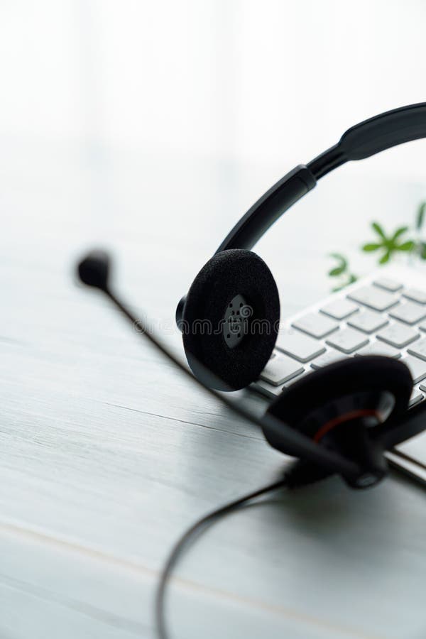 Headset and Computer Keyboard on Wooden Table Stock Image - Image of ...