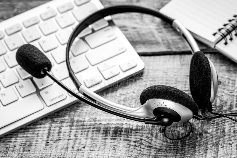 Headset and Keyboard on Workdesk for Call Center Concept Editorial ...
