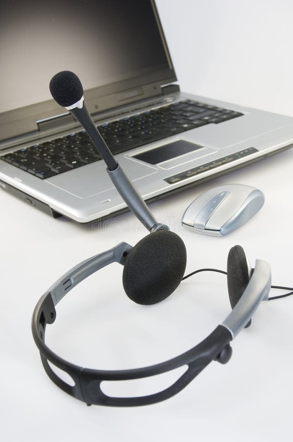 Headset with Laptop stock photo. Image of independent - 9996116