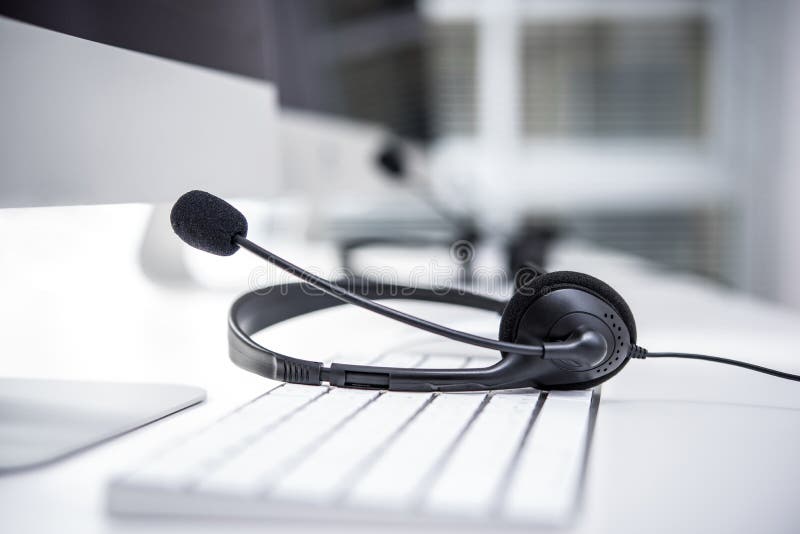 Headset with Microphone on Computer Keyboard Stock Photo - Image of ...