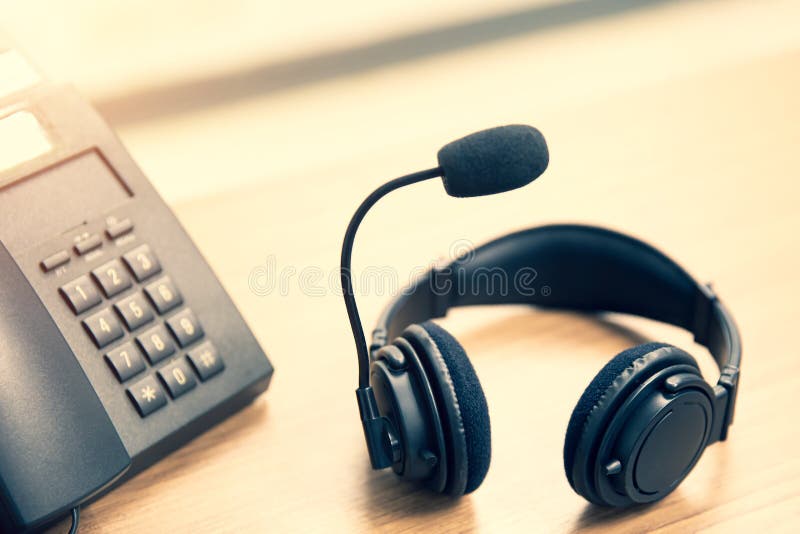 Headset and Telephone for Communication Helpdesk it Support or Call ...