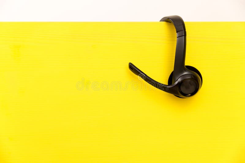 Headset on Yellow Board, Concept for Communication, it Support, Stock ...