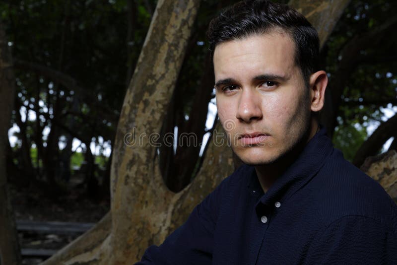 Handsome Cuban Man in a Tropical Park Stock Image - Image of latino ...