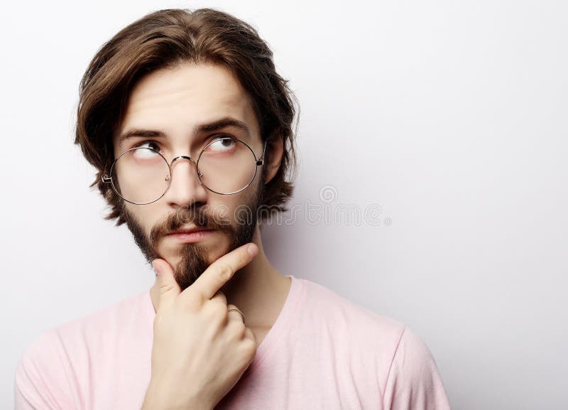 Headshot Of Satisfied Cheerful Man Wearing Glasses Glad To Find
