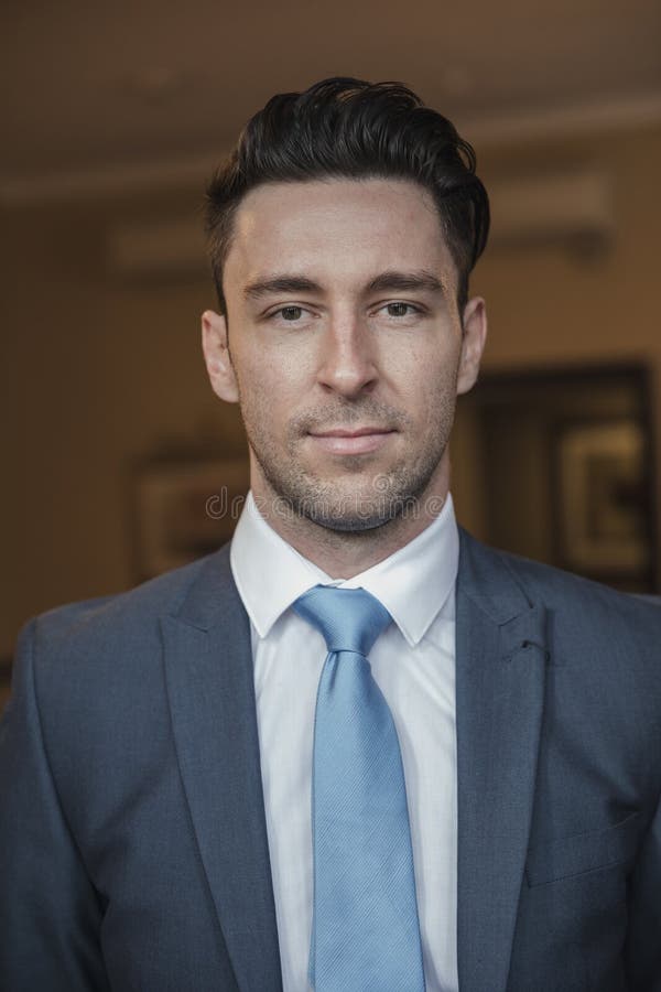 Headshot of a Young Businessman Stock Photo - Image of hair, focus ...