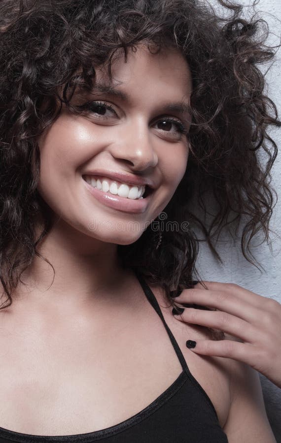 Headshot of a Young Woman Smiling Stock Photo - Image of cute, curly ...