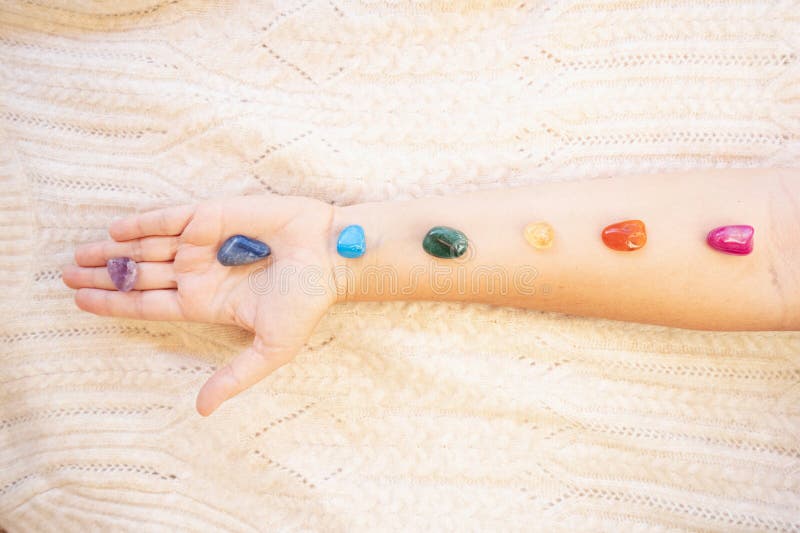 Healing Crystals on Female Hand Background, Seven Chakra Stones Stock ...