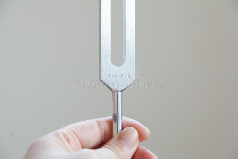 Tuning Fork and Crystal Stone on Table . Stock Photo - Image of balance ...