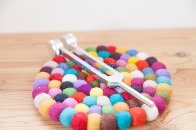 Tuning Fork and Crystal Stone on Table . Stock Image - Image of essence ...