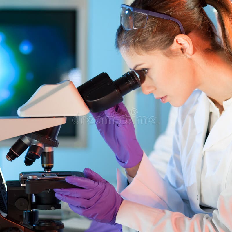 Health Care Professional Microscoping. Stock Image - Image of female ...