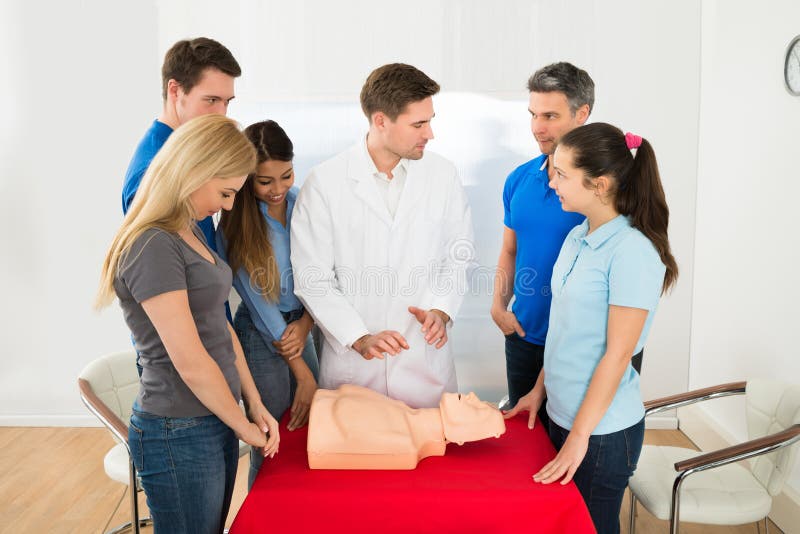 Group of Students Learning Cpr Stock Image - Image of instructor ...