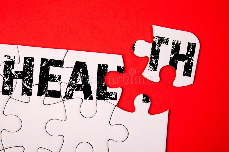 Health Concept. Puzzle Pieces on a Red Background Stock Photo - Image ...