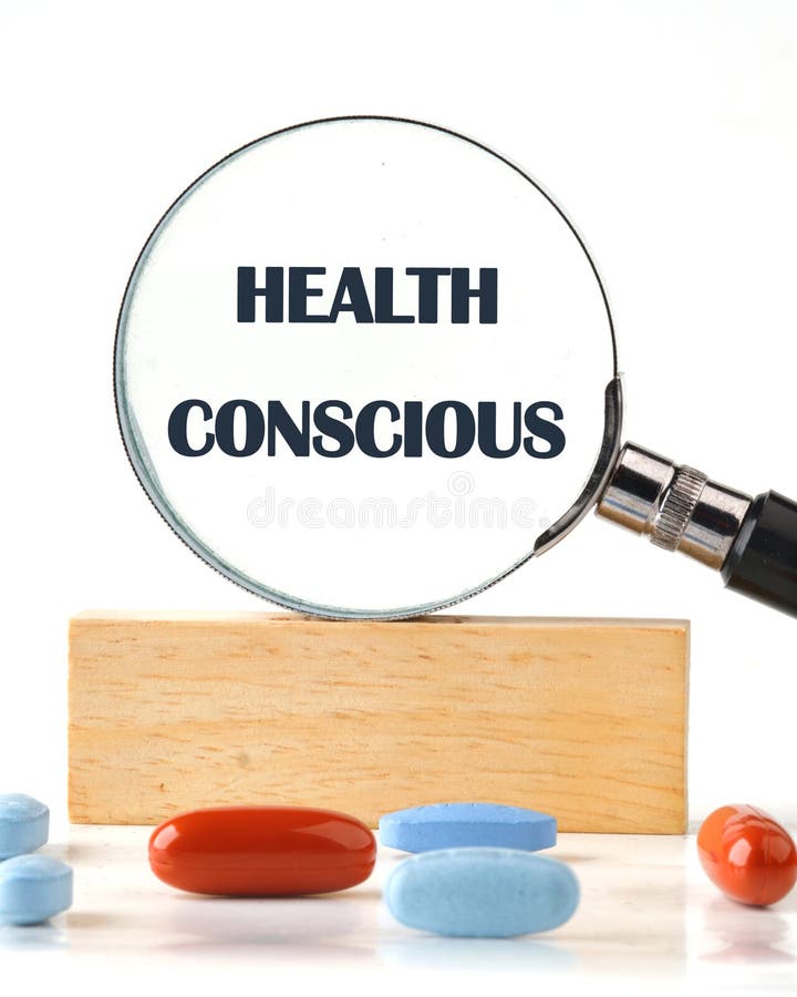 HEALTH CONSCIOUS Text Written Close-up through a Magnifying Glass ...
