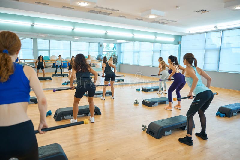 Health Group for a Lesson with Sticks on Platforms Stock Image - Image ...