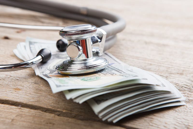 Health Insurance Concept - Stethoscope Over the Money Stock Photo ...
