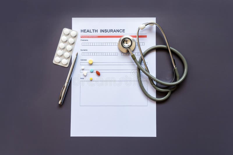 Health Insurance Form with Model and Policy Document Stock Photo ...