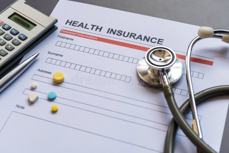 Health Insurance Form with Model and Policy Document Stock Photo ...