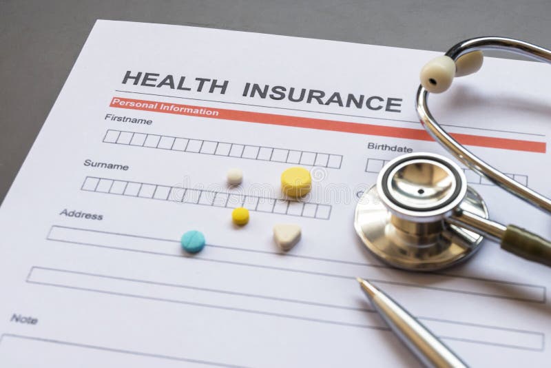 Health Insurance Form with Model and Policy Document Stock Image ...