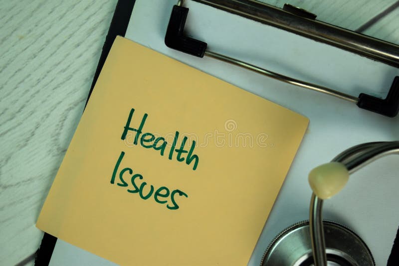 Health Issues Write on Sticky Notes Isolated on Wooden Table Stock ...