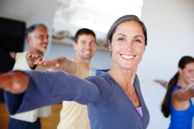Health Makes Her Happy. a Group of People Taking a Class Together at ...